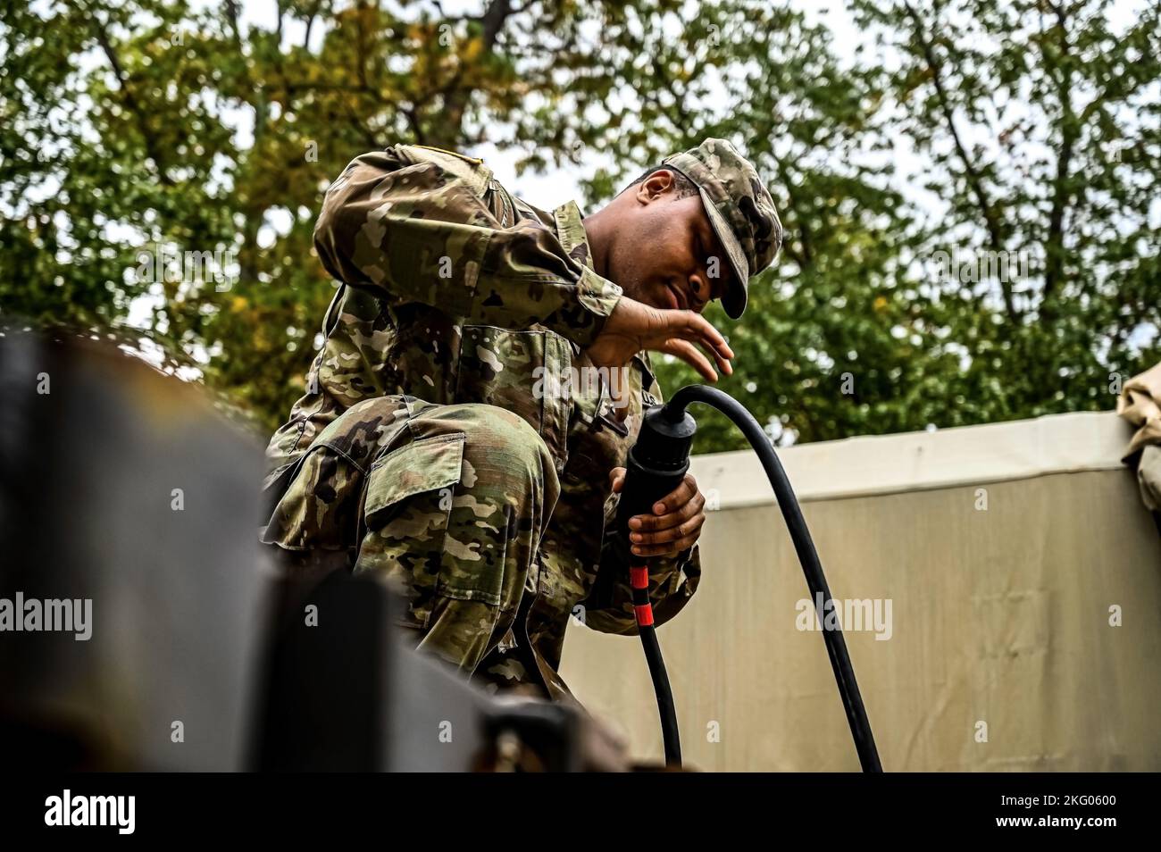 A U.S. Army Soldier assigned to the U.S. Army 58th Troop Command set up ...