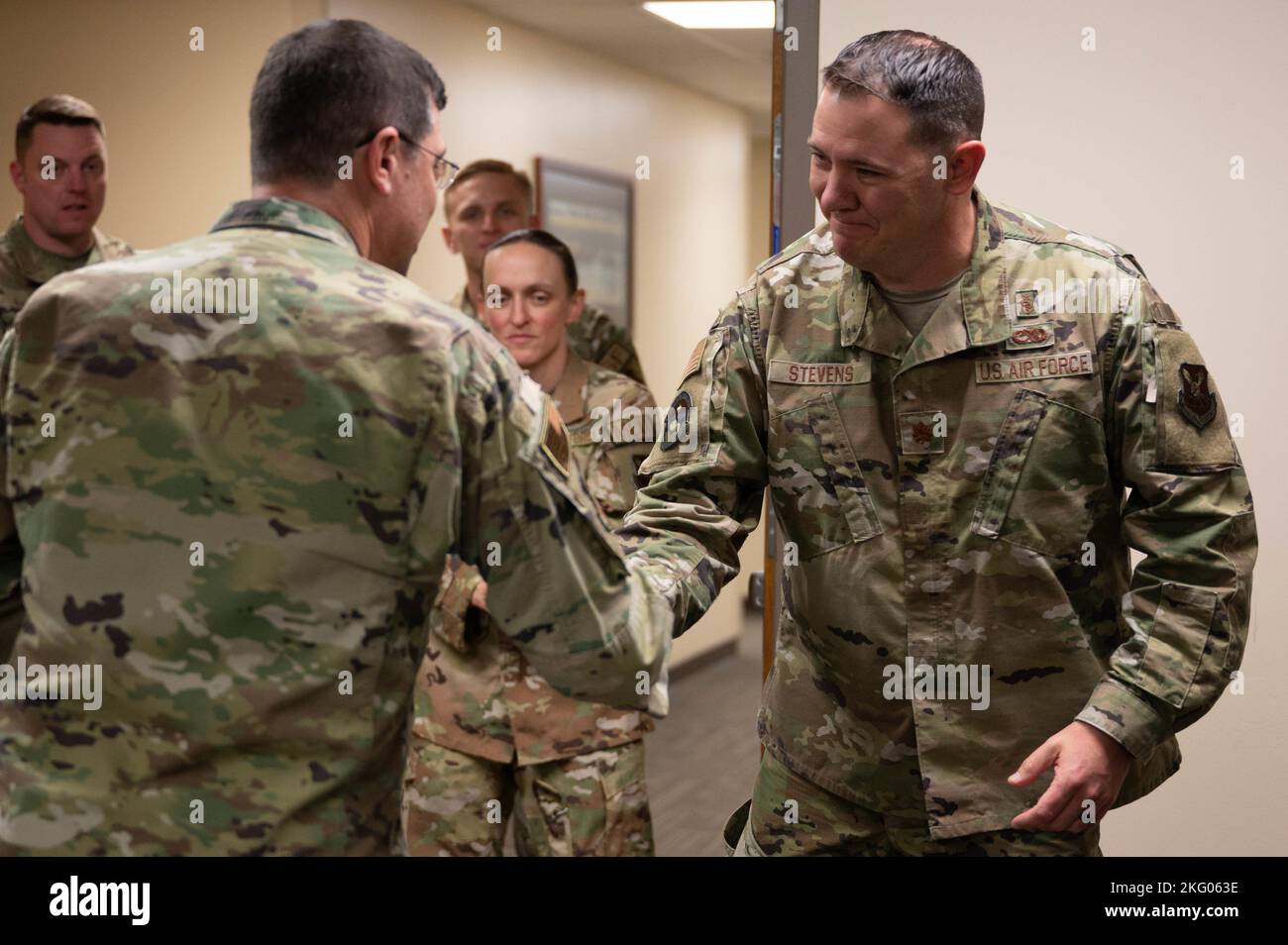 Maj. Charlie Stevens, assigned to the 28th Bomb Wing, receives a coin ...