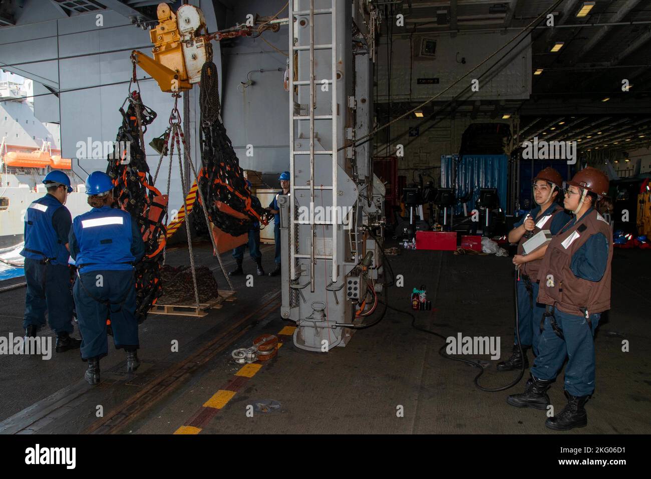 Boatswain’s Mate 3rd Class Jennifer Flores, right, from San Antonio ...