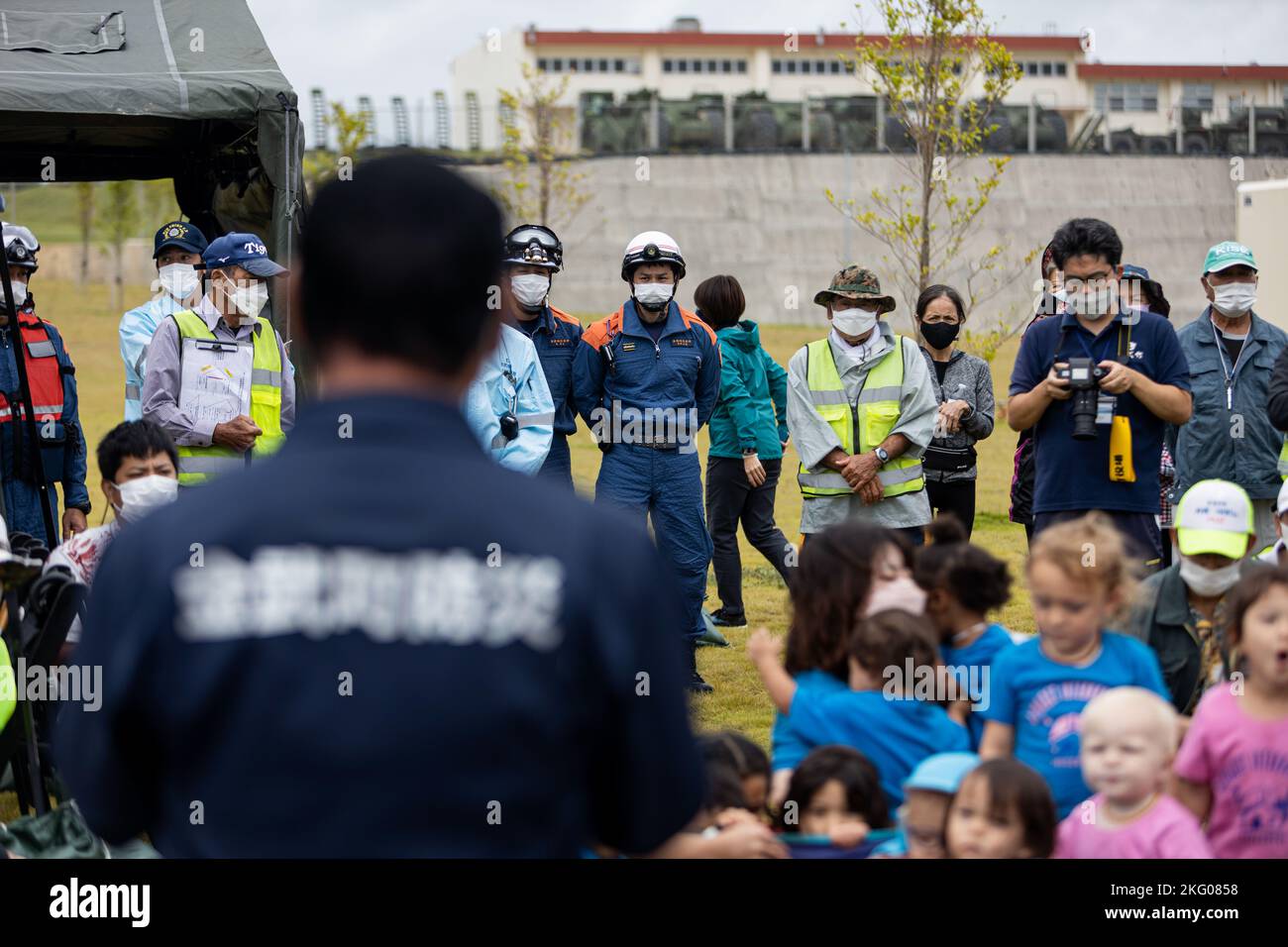 Hajime Nakama, the mayor of Kin, Okinawa, speaks to participants and ...