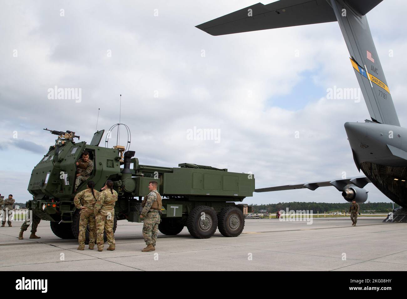 U.S. Marines with Combat Logistics Company (CLC) 21 and U.S. Airmen ...
