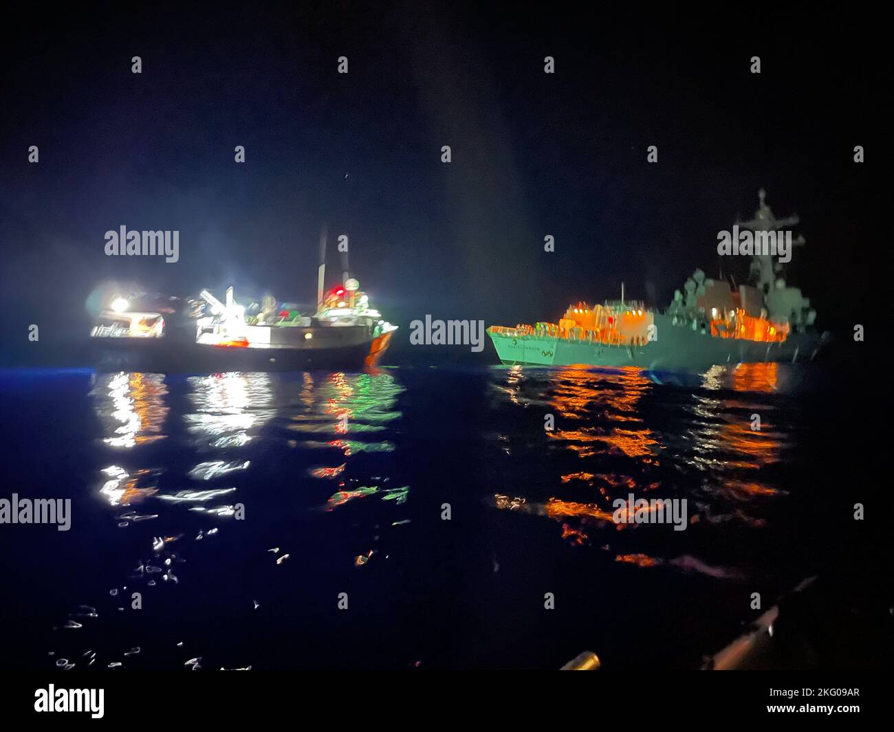 At 0230 HST, USS DANIEL INOUYE (DDG 118) takes fishing vessel SEA ...