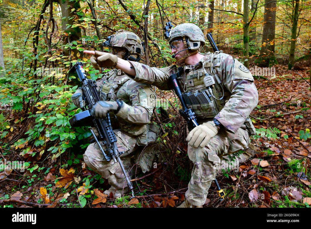 U.S. Army Spc. Joshua Wilson, right, with Bull Troop, 1st Squadron, 2nd ...