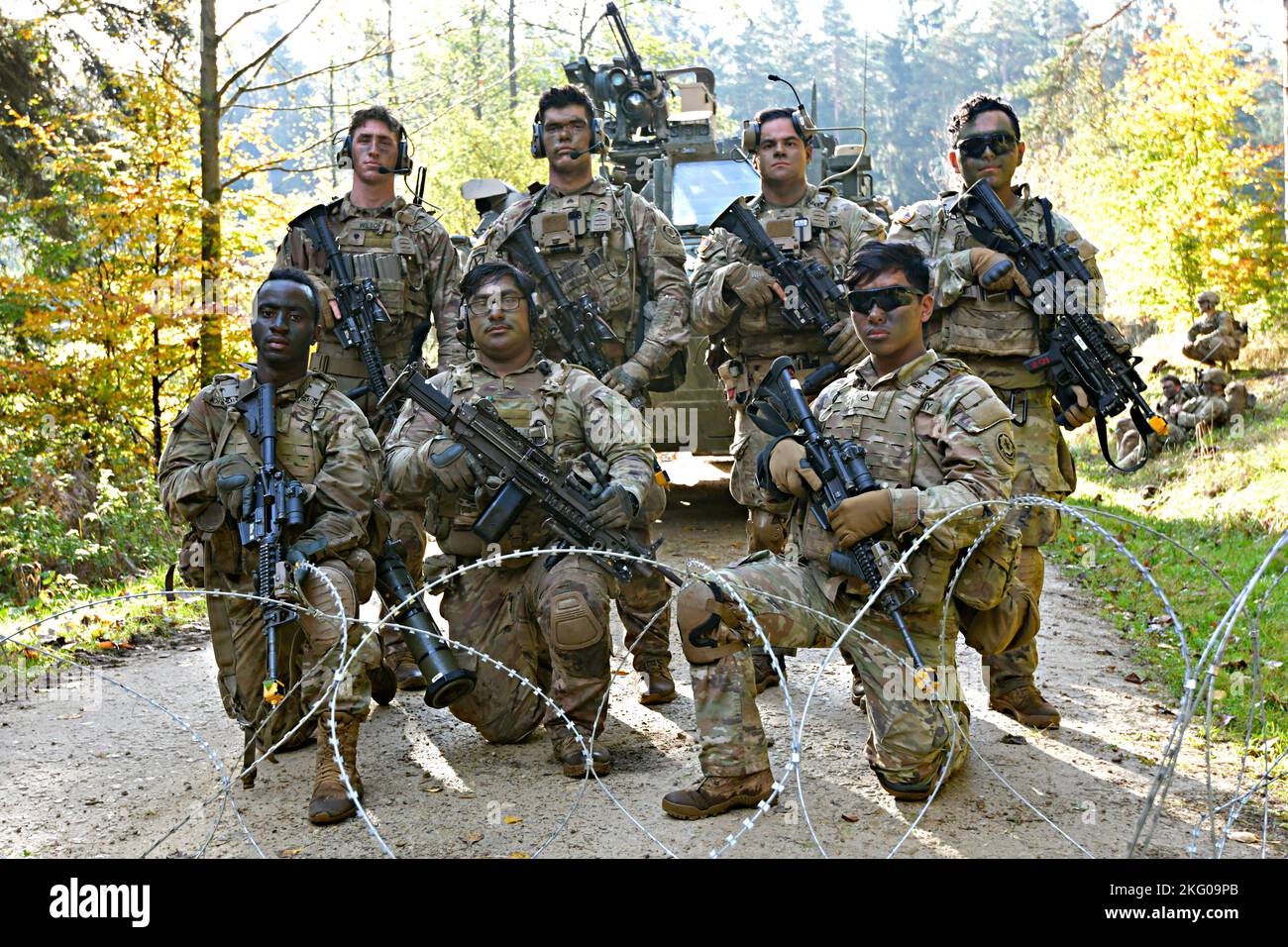 U.S. Soldiers with Bull Troop, 1st Squadron, 2nd Cavalry Regiment stand ...