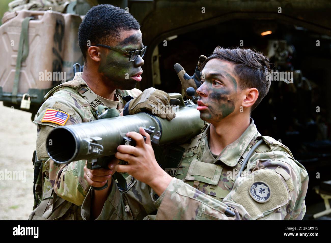 U.S. Soldiers with Bull Troop, 1st Squadron, 2nd Cavalry Regiment check ...