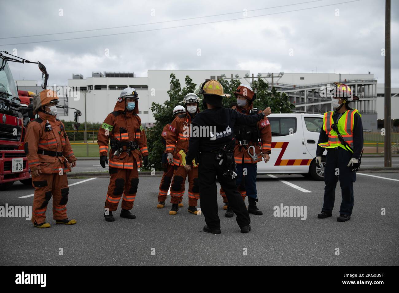 A firefighter with Camp Kinser Fire Station, Marine Corps Installations ...