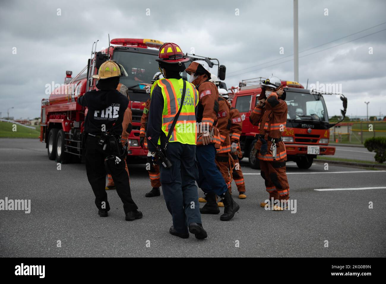 A firefighter with Camp Kinser Fire Station, Marine Corps Installations ...