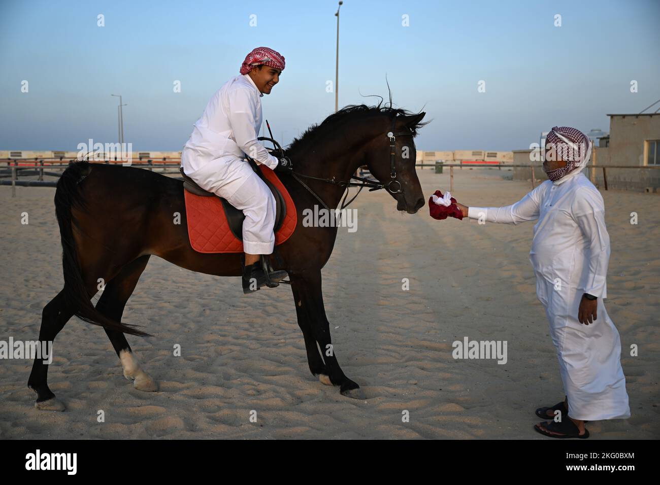 Al Ruwais, Qatar. 20th Nov, 2022. Qatari Marwan Sameh (l) and Khalid Al ...