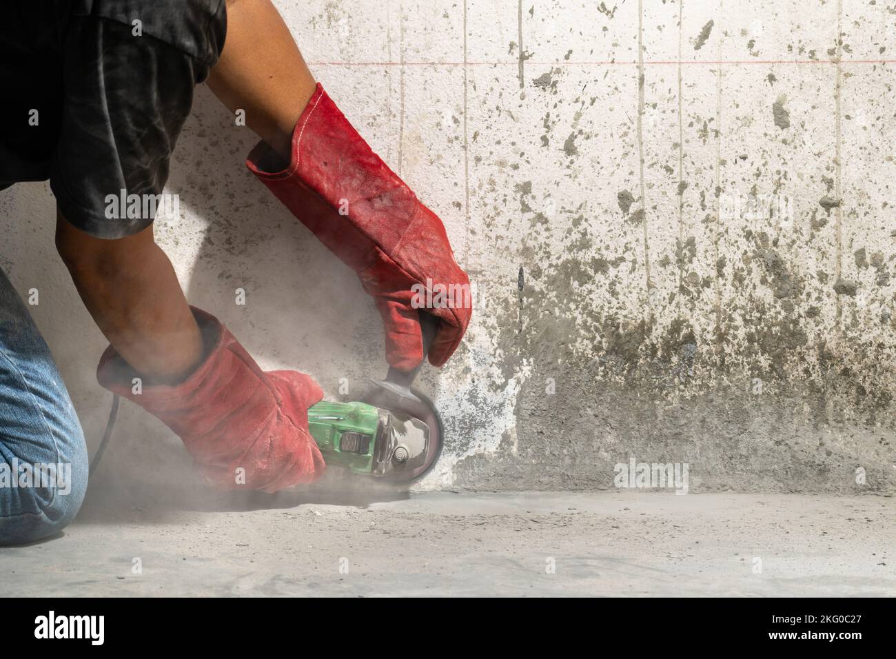 Renovation home , Painter scraping concrete debris on wall from ...