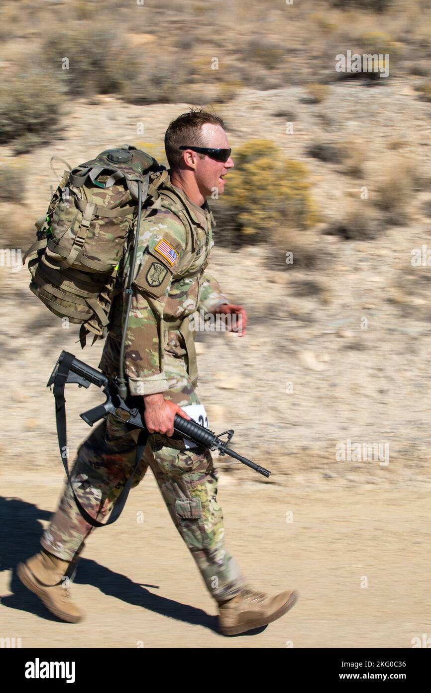 Staff Sgt. Nathan Woods with 97th Troop Command, completes a 12 ...