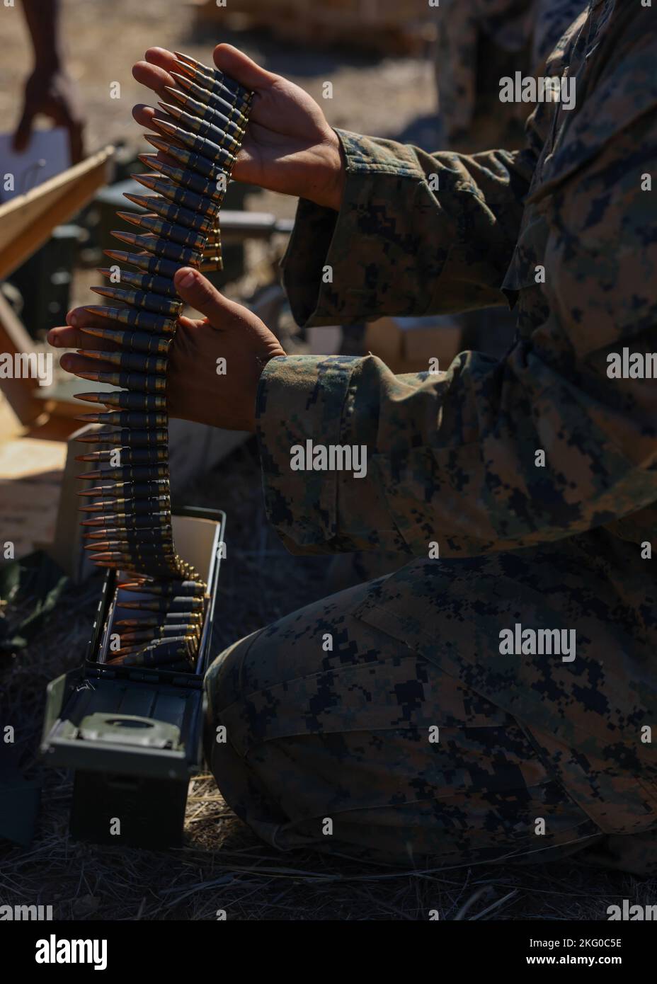 U.S. Marine Lance Cpl. Miguel Nelson, a machine gunner with Lima ...