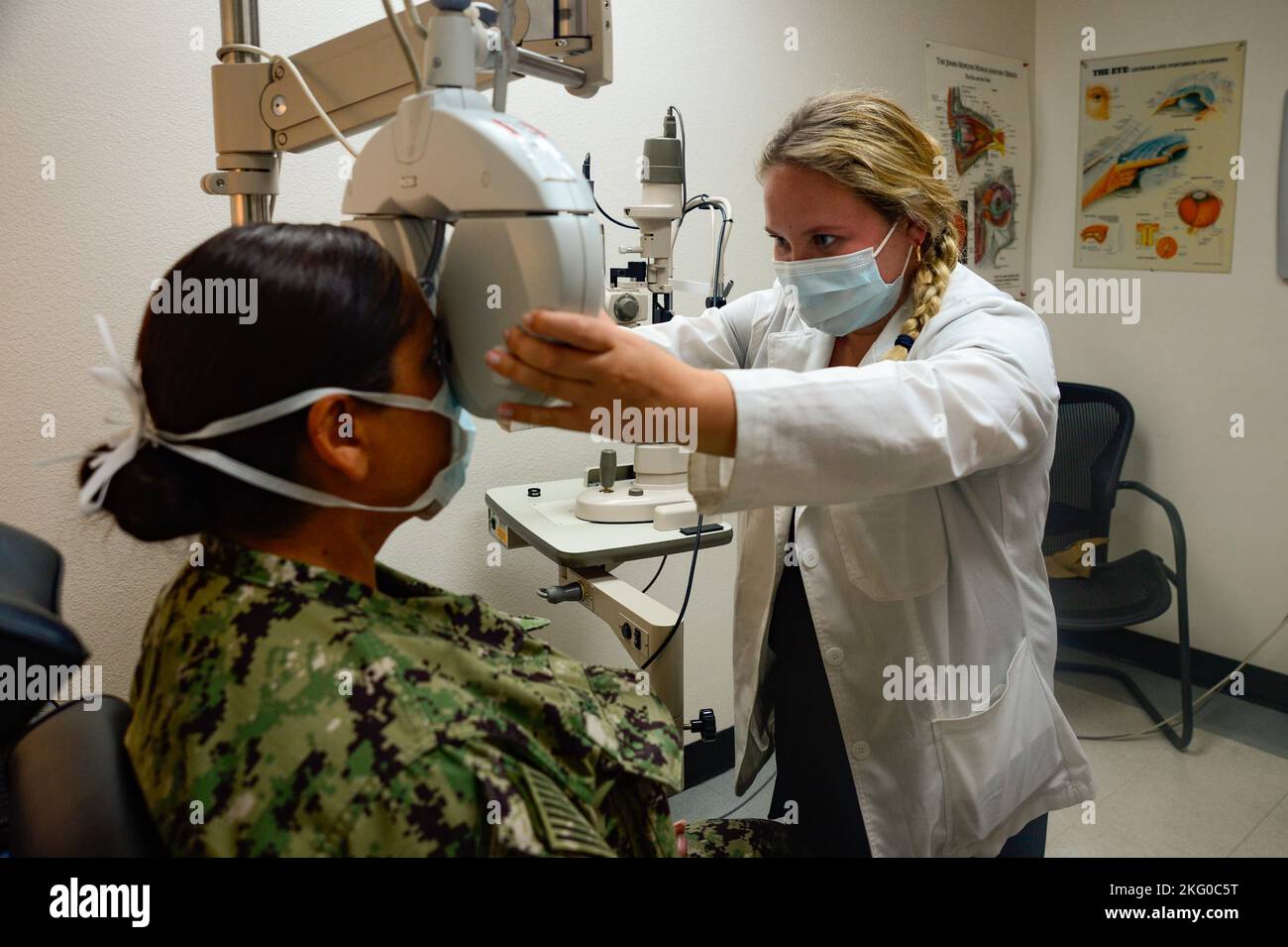 SAN DIEGO (Oct. 18, 2022) Jada Mattson conducts an eye exam on Chief ...