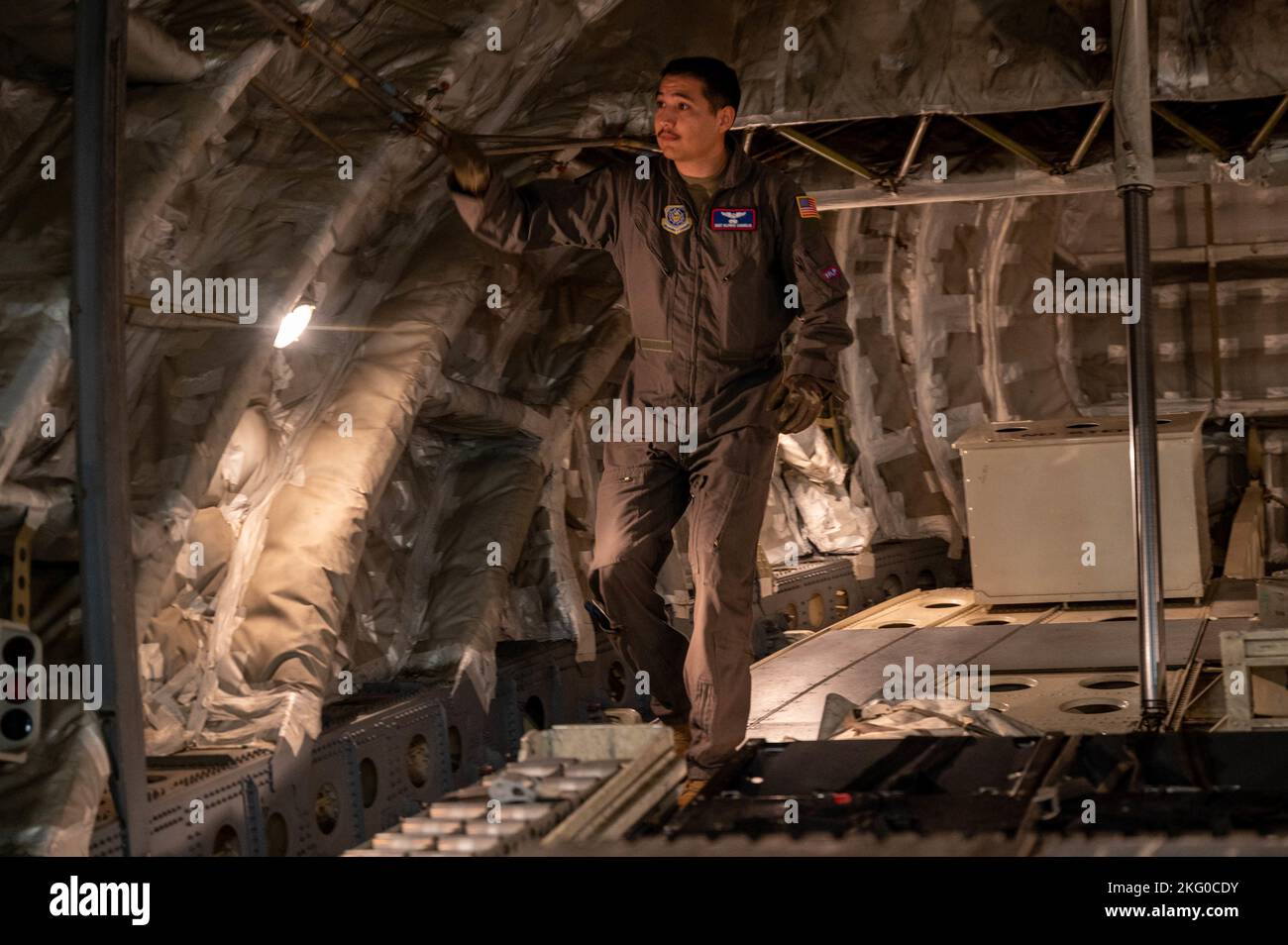 U.S. Air Force Staff Sgt. Alonso Carrillo, a loadmaster with the 4th ...