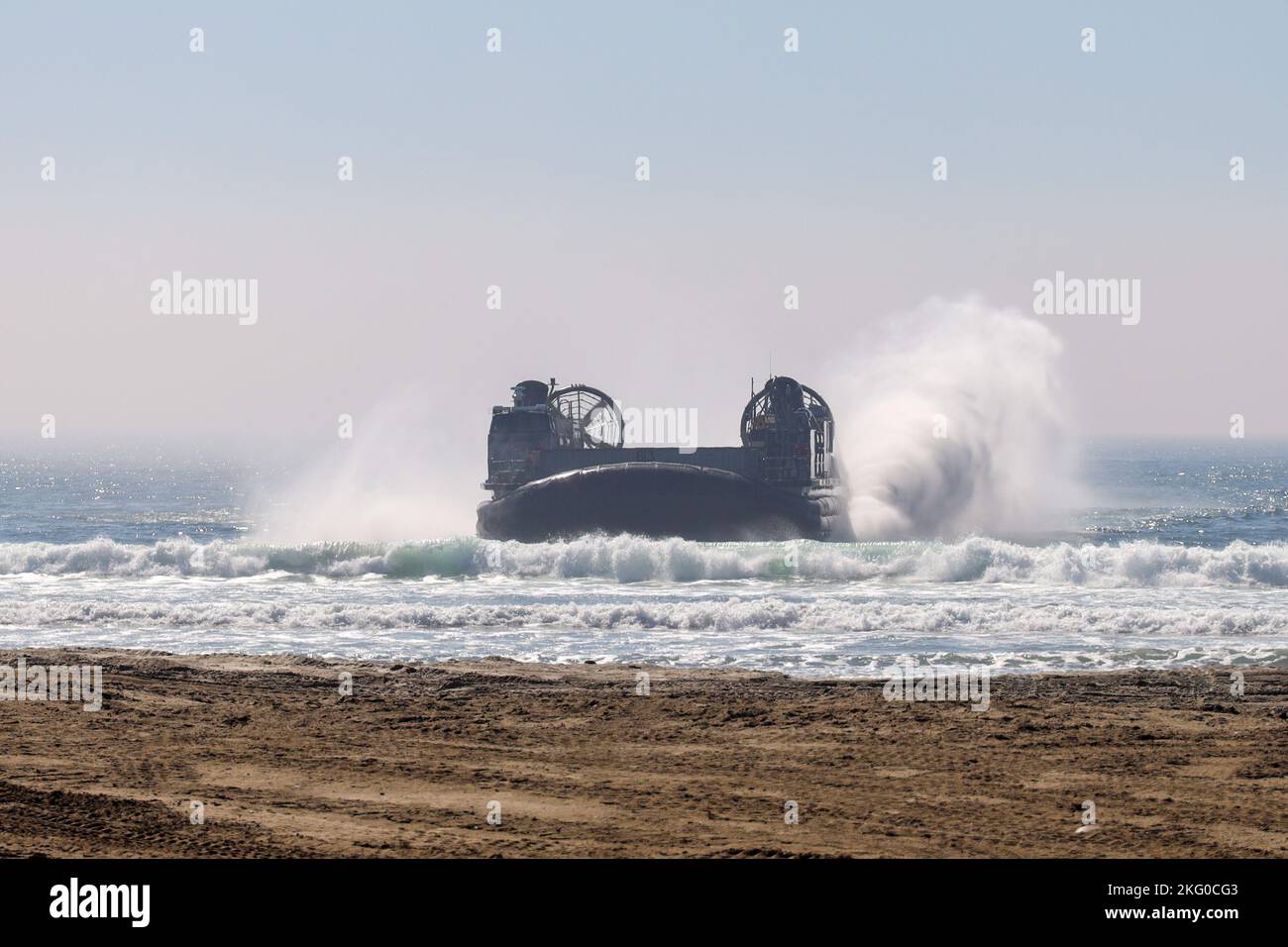 A Landing Craft Air Cushion (LCAC) approaches Red Beach during Project Convergence 2022 (PC22 ...