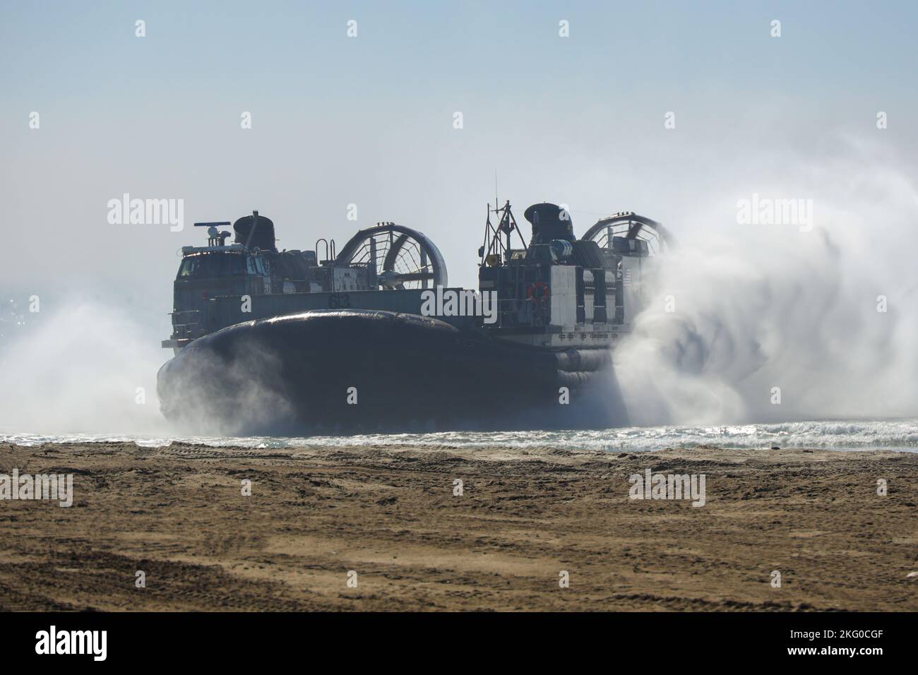 A Landing Craft Air Cushion (LCAC) lands on Red Beach during Project ...