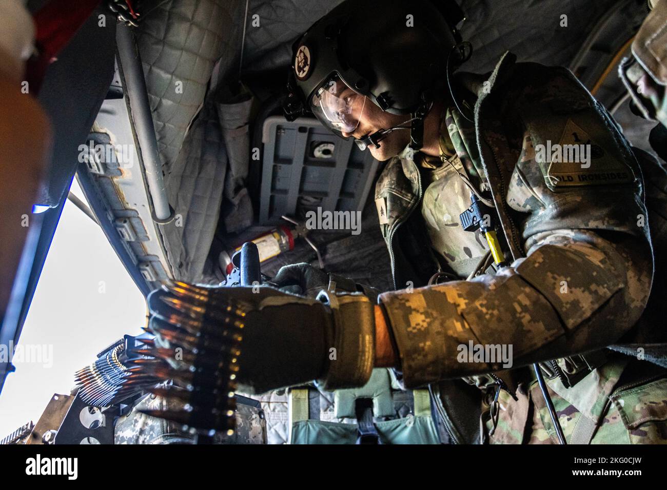 U.S. Army Sgt. Quinlan Merrill, a CH-47 Chinook Crew Chief assigned to ...