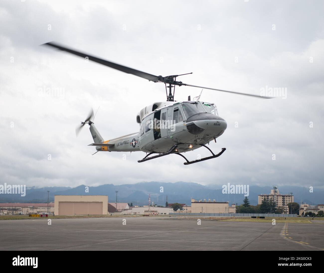 A U.S. Air Force UH-1N helicopter from the 459th Airlift Squadron lands ...