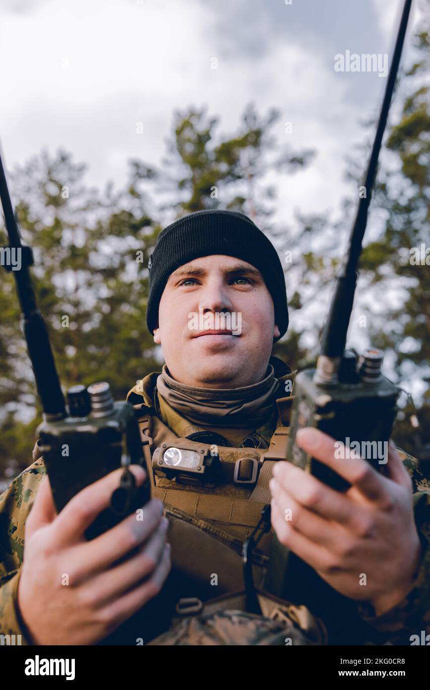 U.S. Marine Corps Pfc. Jozef Rael, a radio operator with Combat ...