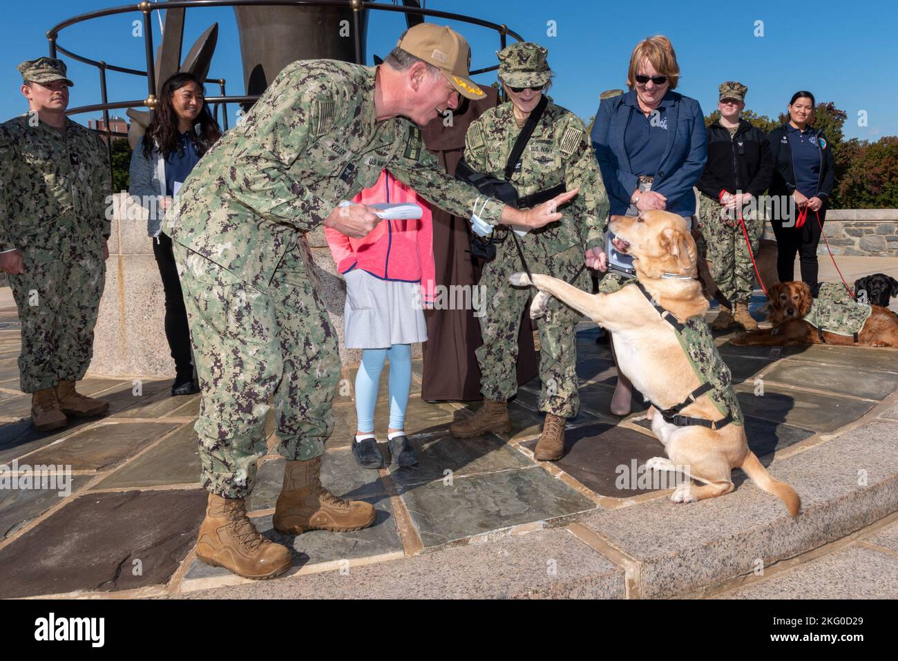 A promotion and commissioning ceremony for the Facility Dog Program at ...