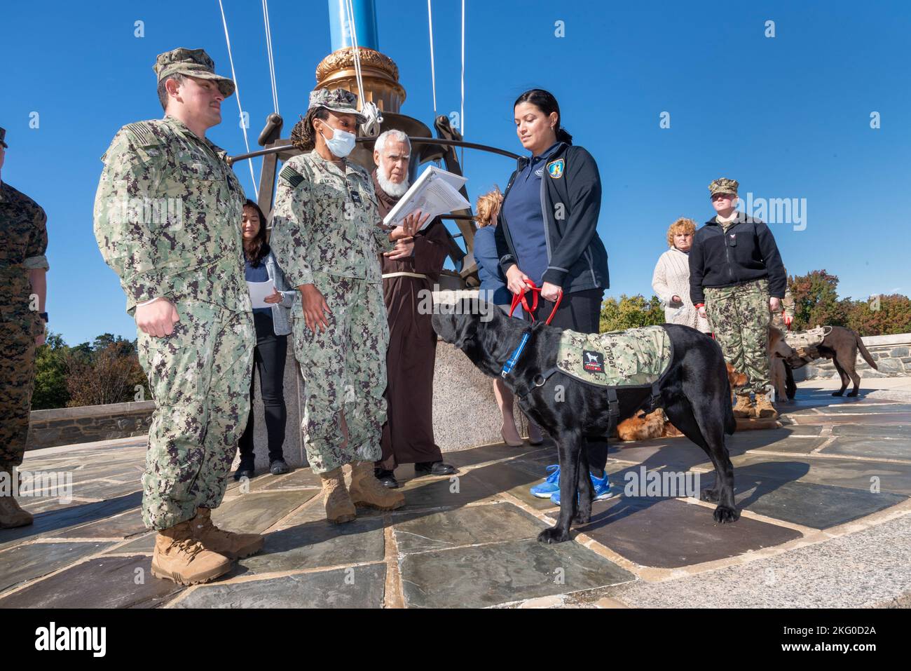 A promotion and commissioning ceremony for the Facility Dog Program at ...