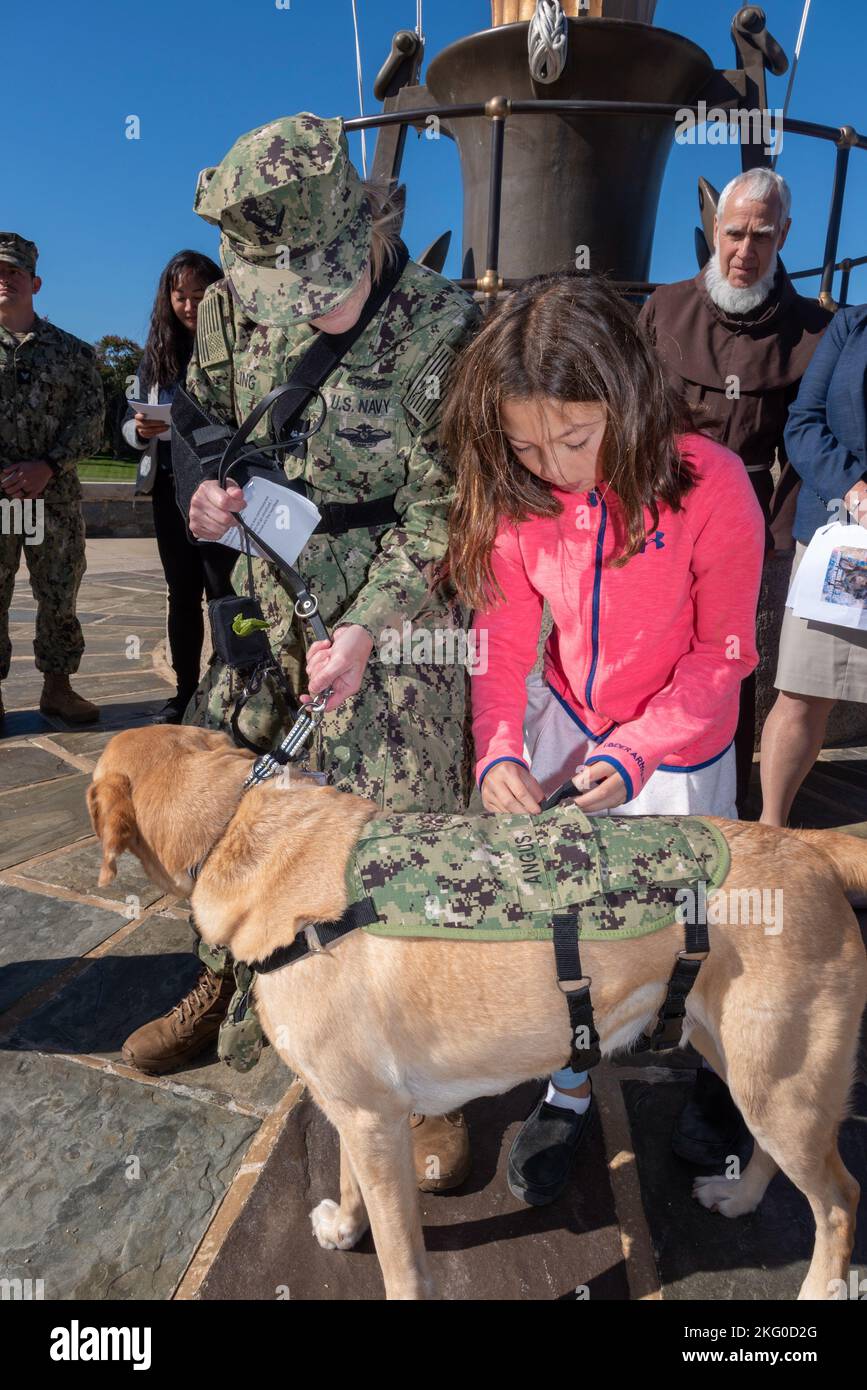 A promotion and commissioning ceremony for the Facility Dog Program at ...