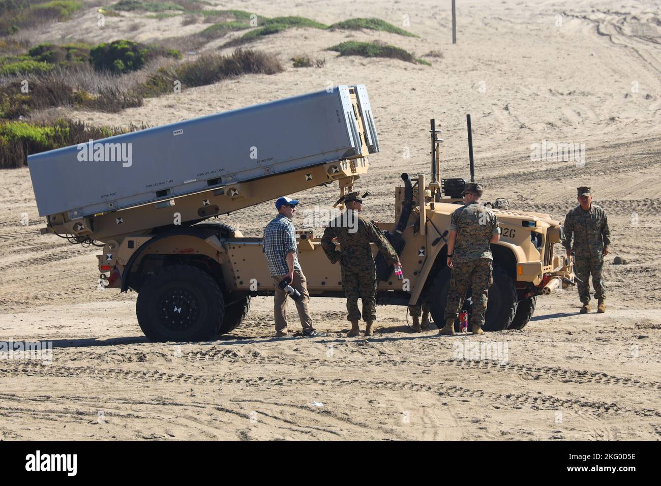 U.S. Marines with I Marine Expeditionary Force, deploy a Navy Marine ...