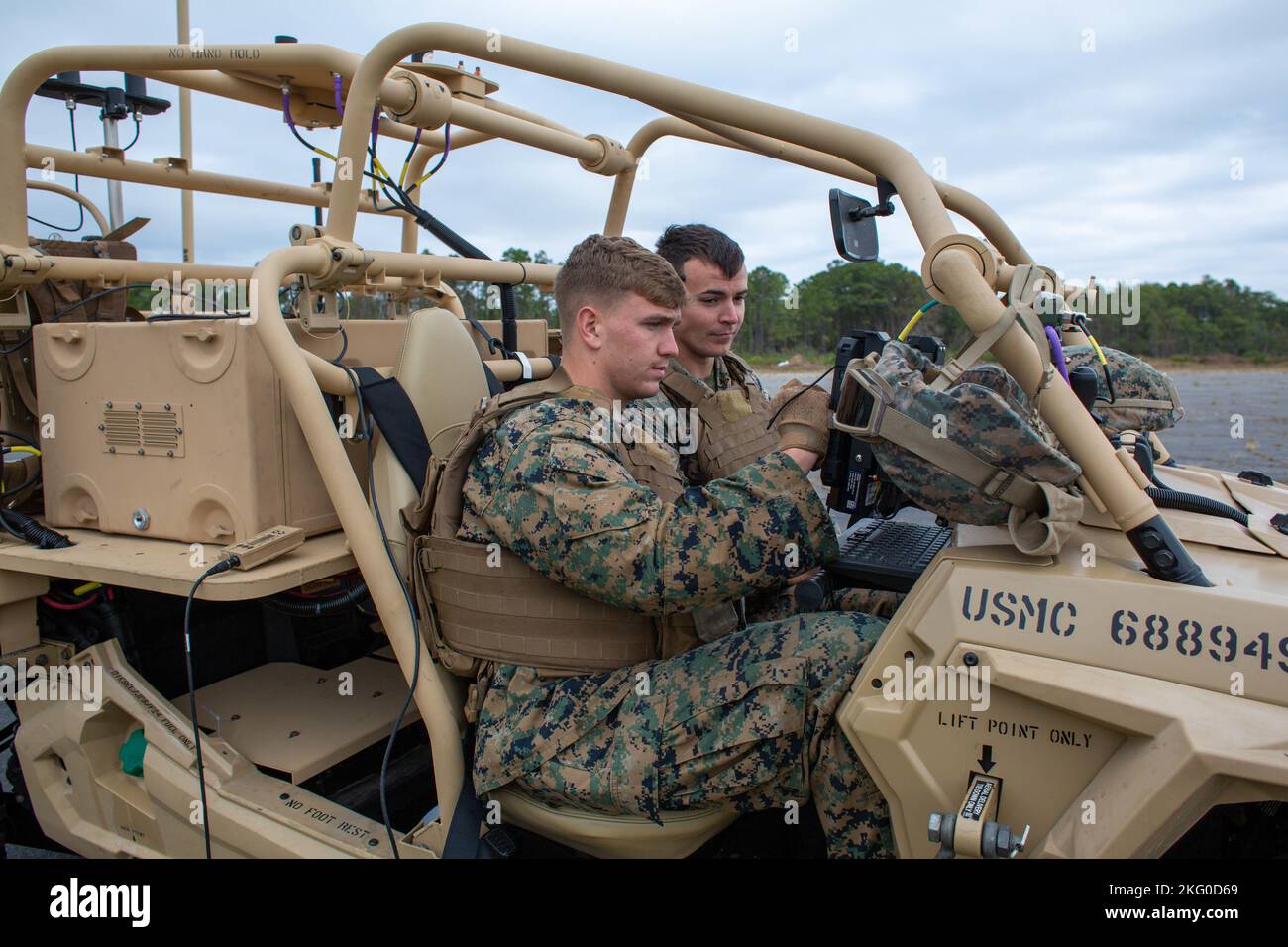 U.S. Marine Corps Pfc. Clayton Hilemon (left) and Cpl. Seth Silveira ...