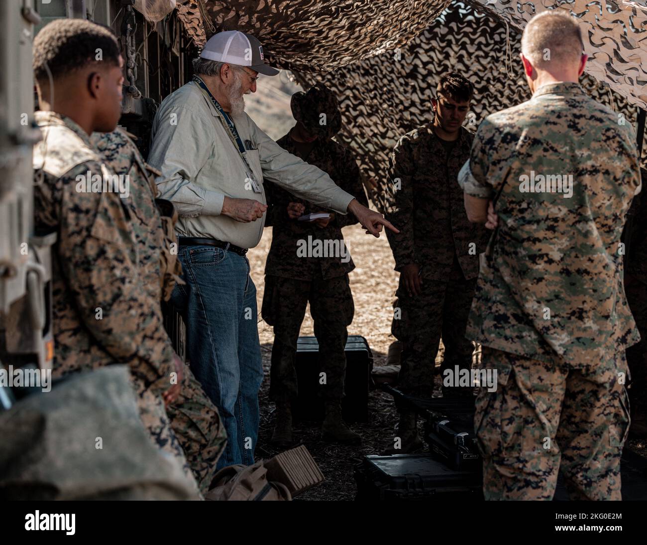 Timothy Bentley, program officer for force health protection, gives his ...