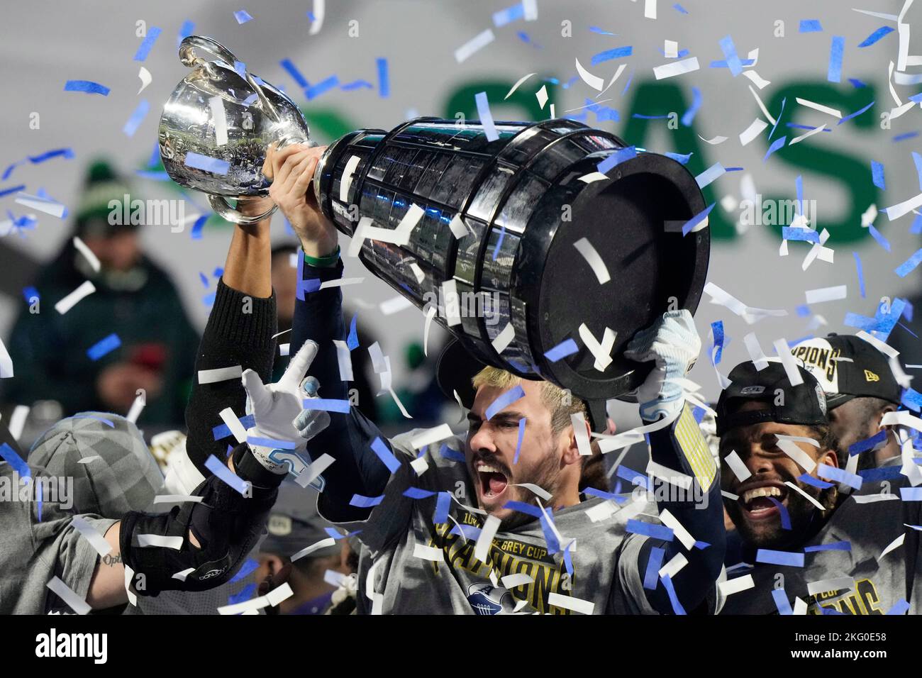 Toronto Argonauts quarterback Chad Kelly (12) hoists the Grey Cup as he ...