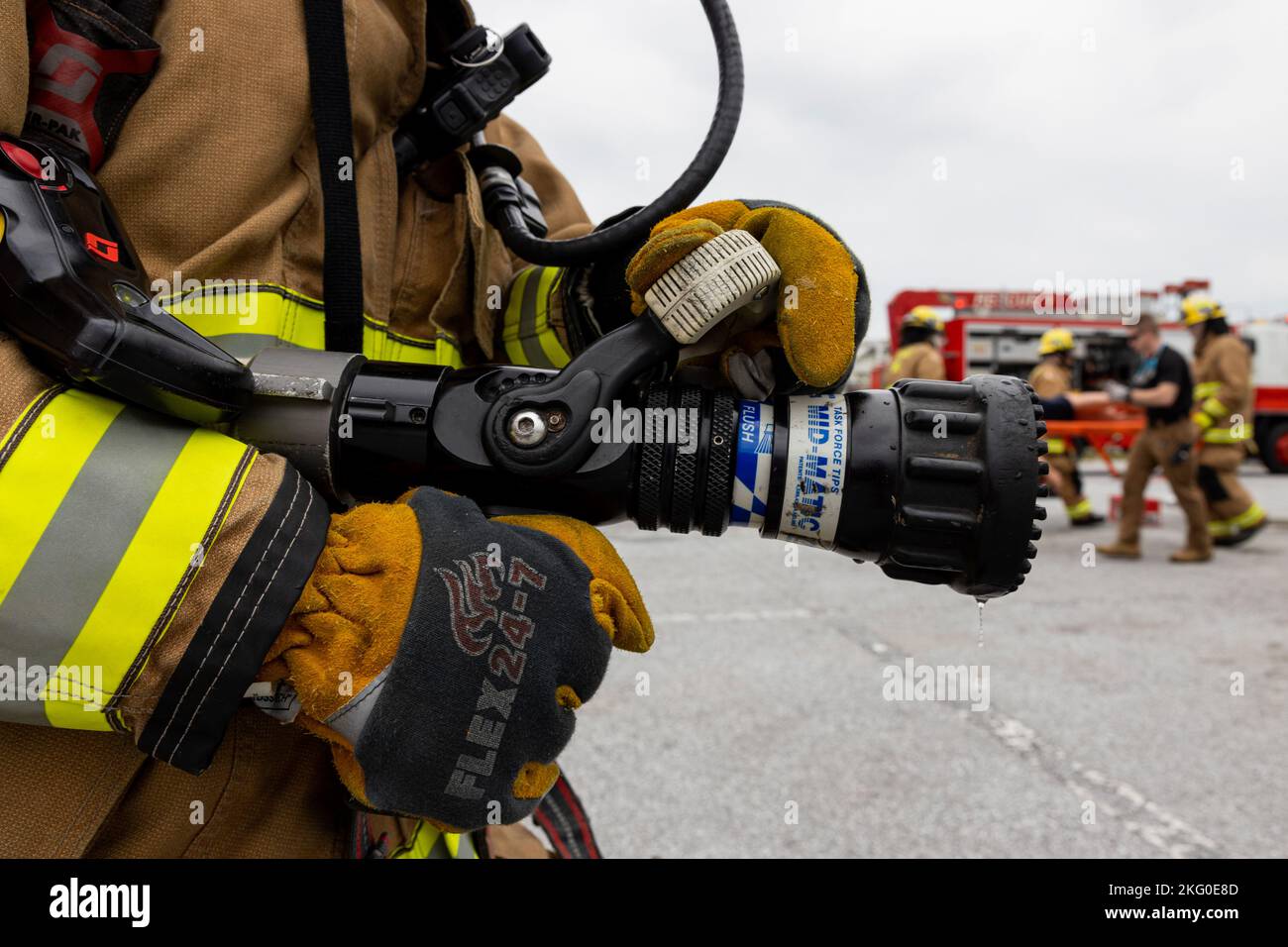 A firefighter with Marine Corps Installations Pacific Fire and ...
