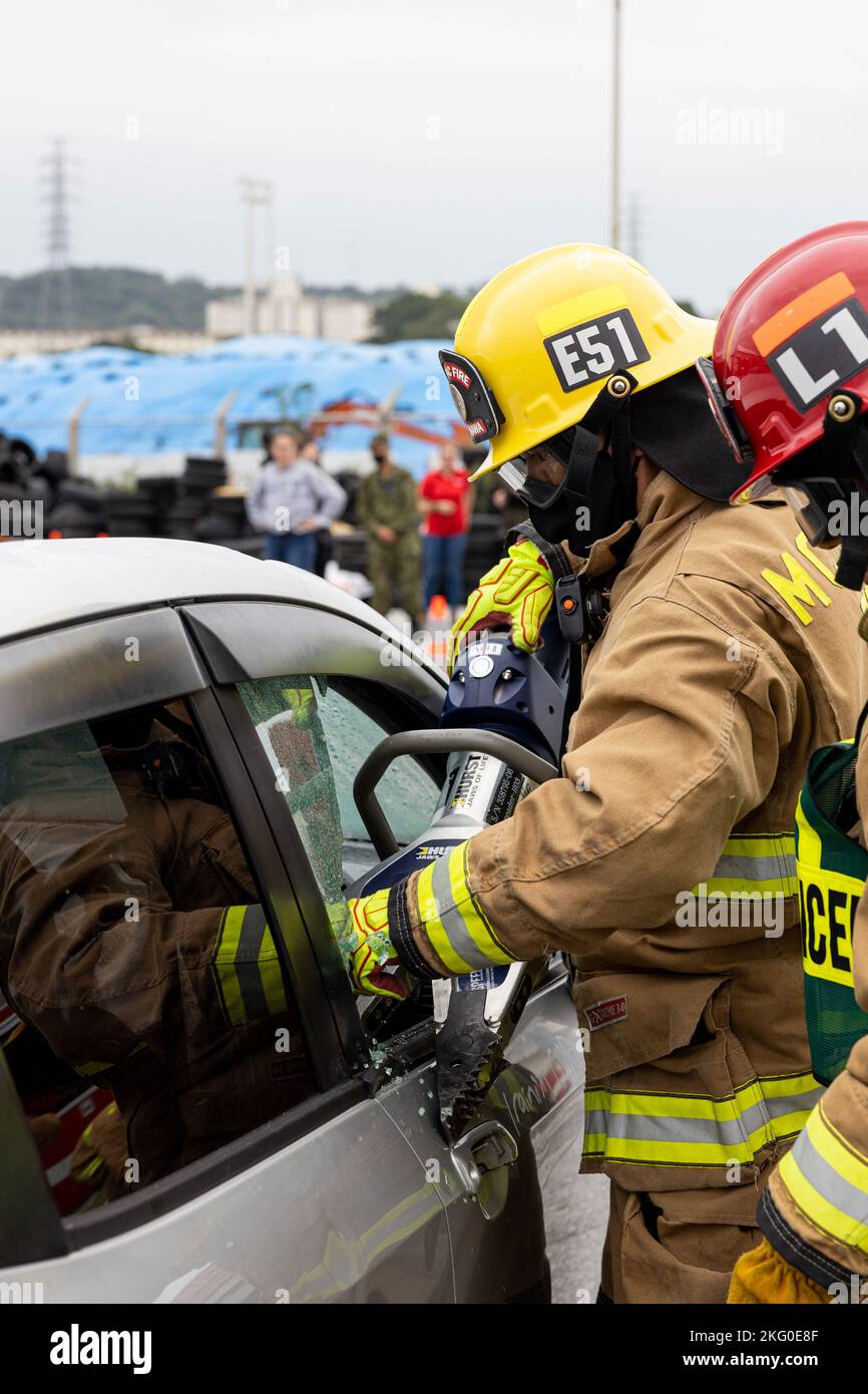 A firefighter with Marine Corps Installations Pacific Fire and ...