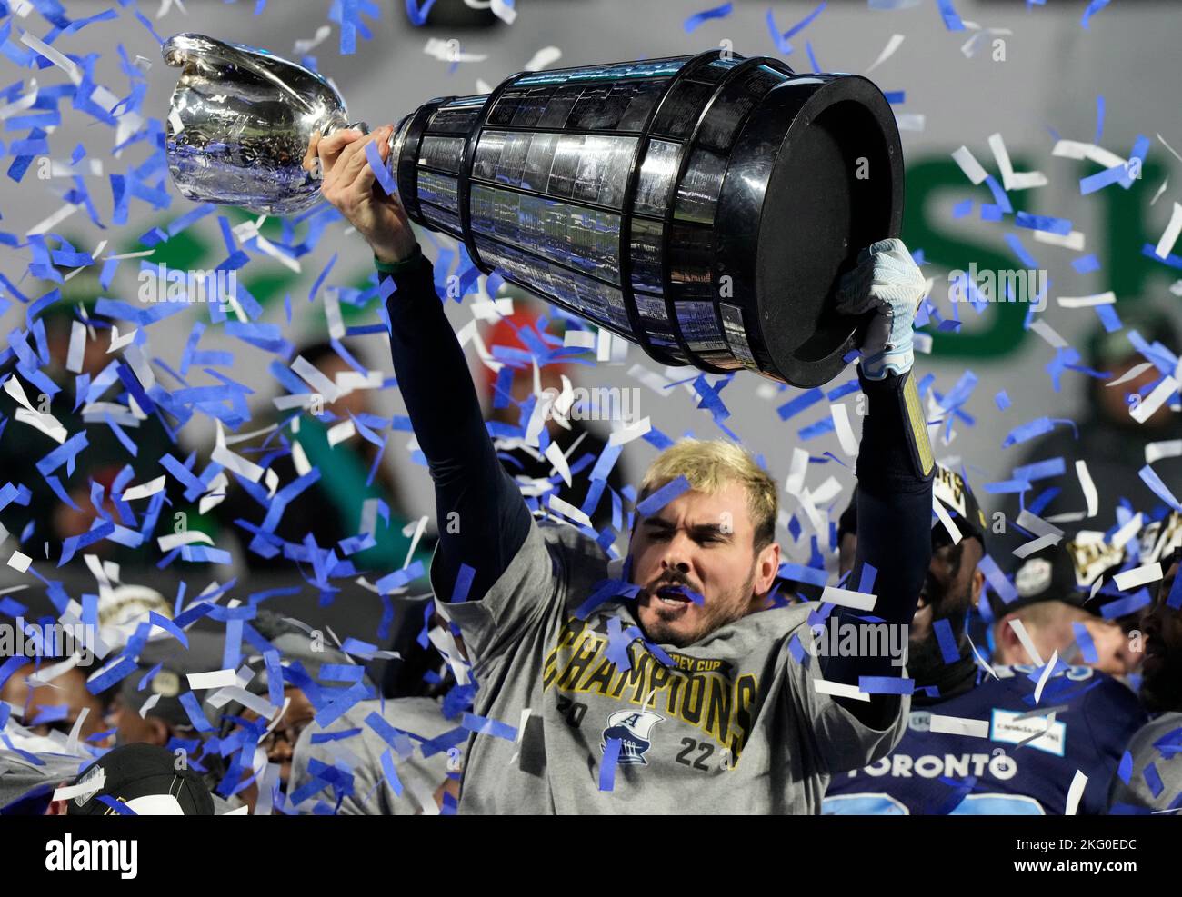 Toronto Argonauts quarterback Chad Kelly hoists the Grey Cup as he ...