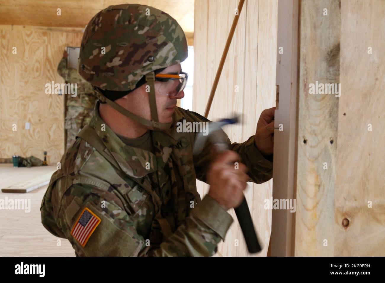 Specialist Dennis May, a plumber with the 461st Engineer Company ...