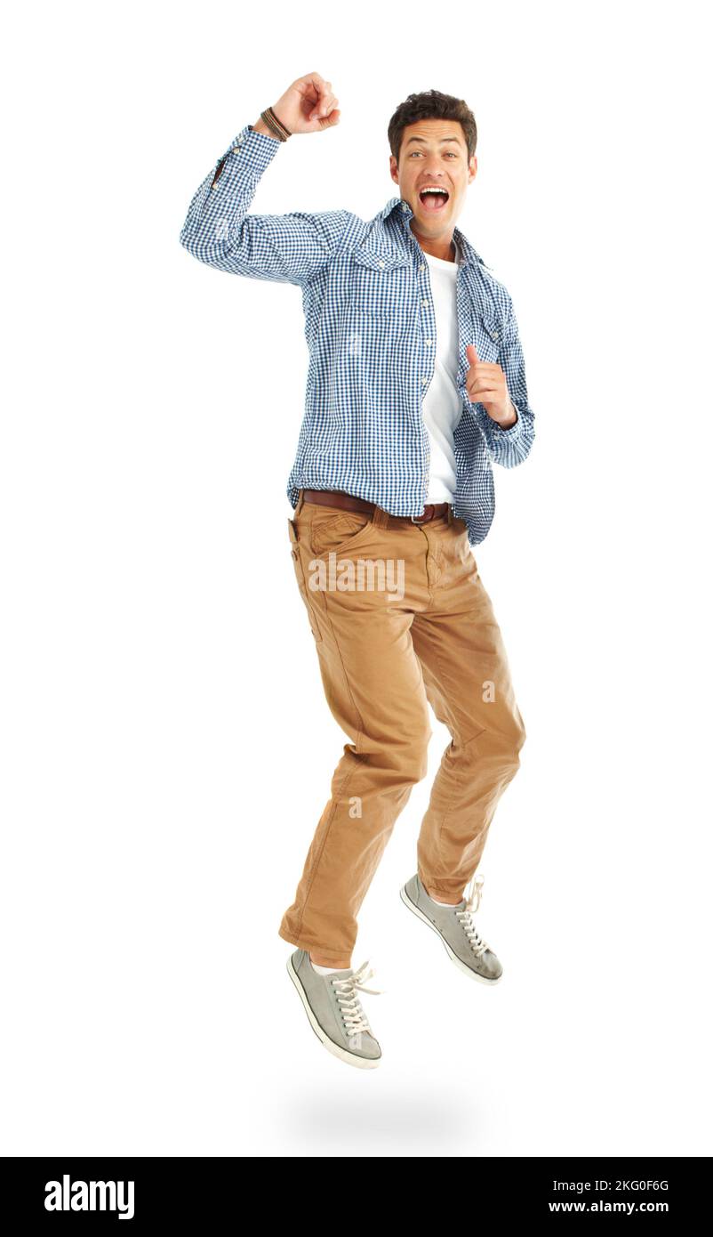 Leaping with positivity. Handsome young guy jumping energetically ...