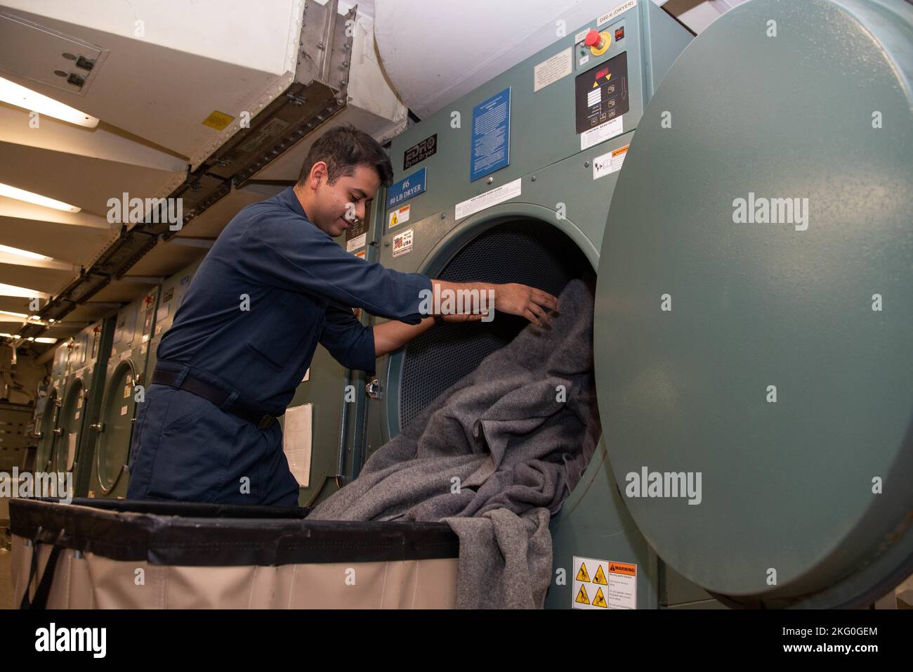 Retail Services Specialist Seaman Carlos Oronia, from Denver, assigned ...