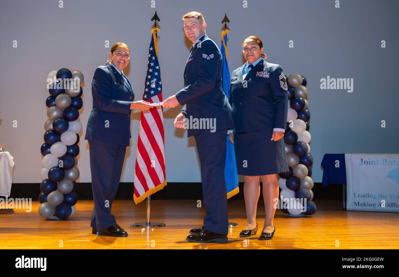 A U.S. Air Force Airman receives the Community College of the Air Force ...