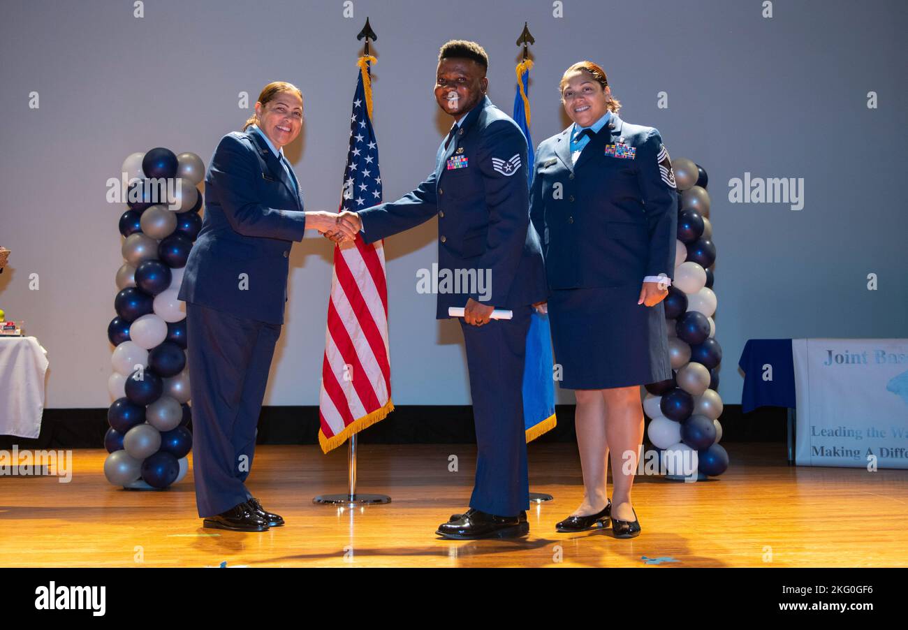A U.S. Air Force Airman receives the Community College of the Air Force ...