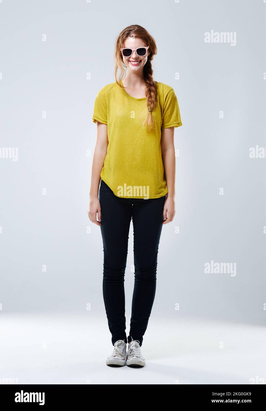 Wearing her favorite shades. Full-length studio portrait of an ...