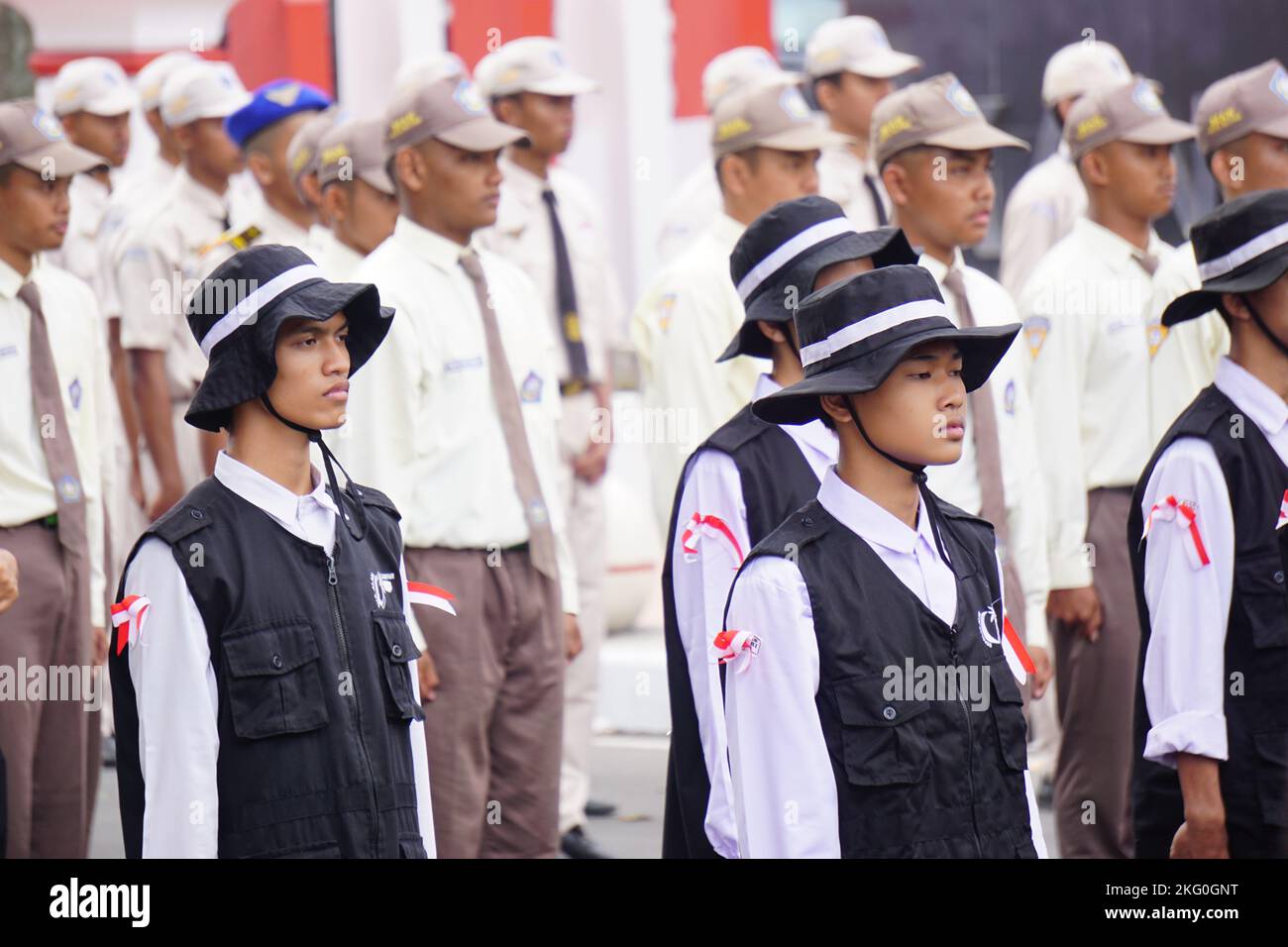 Indonesian senior high school students with uniforms, marching to ...