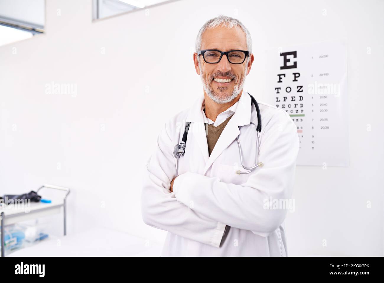 The vision expert. Portrait of a mature male optometrist standing in ...