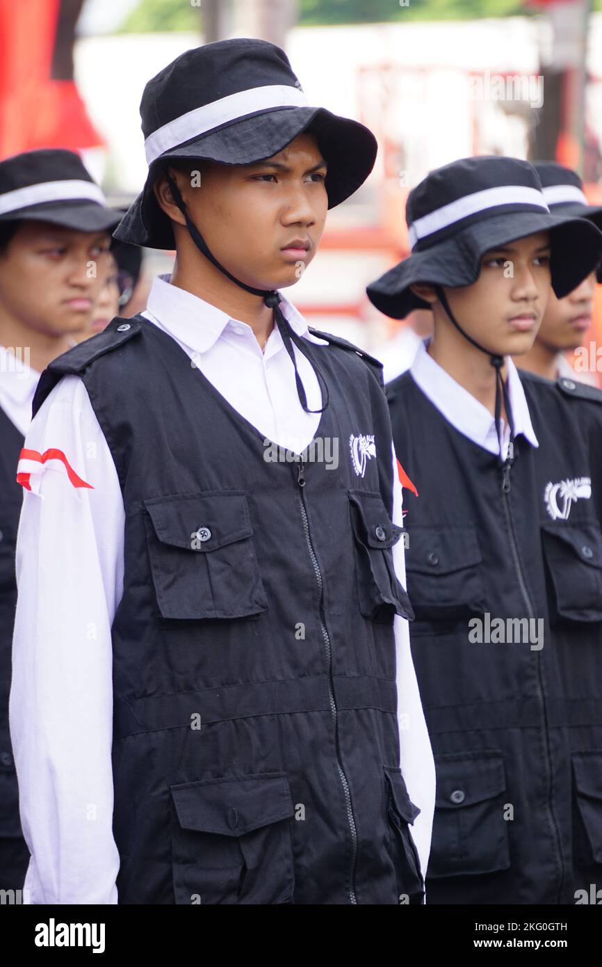 Indonesian senior high school students with uniforms, marching to ...