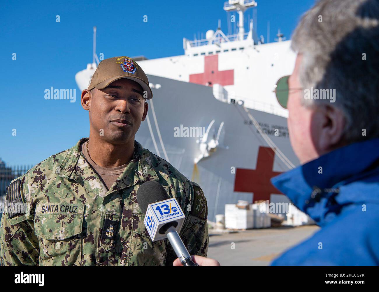Command Senior Chief Brian Santa Cruz conducts an interview with the local news as the hospital ...