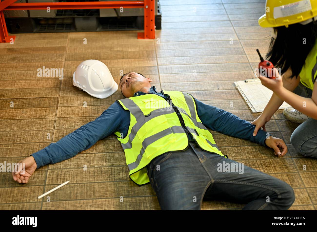 Unconscious man pass out or blackout while working in the warehouse ...