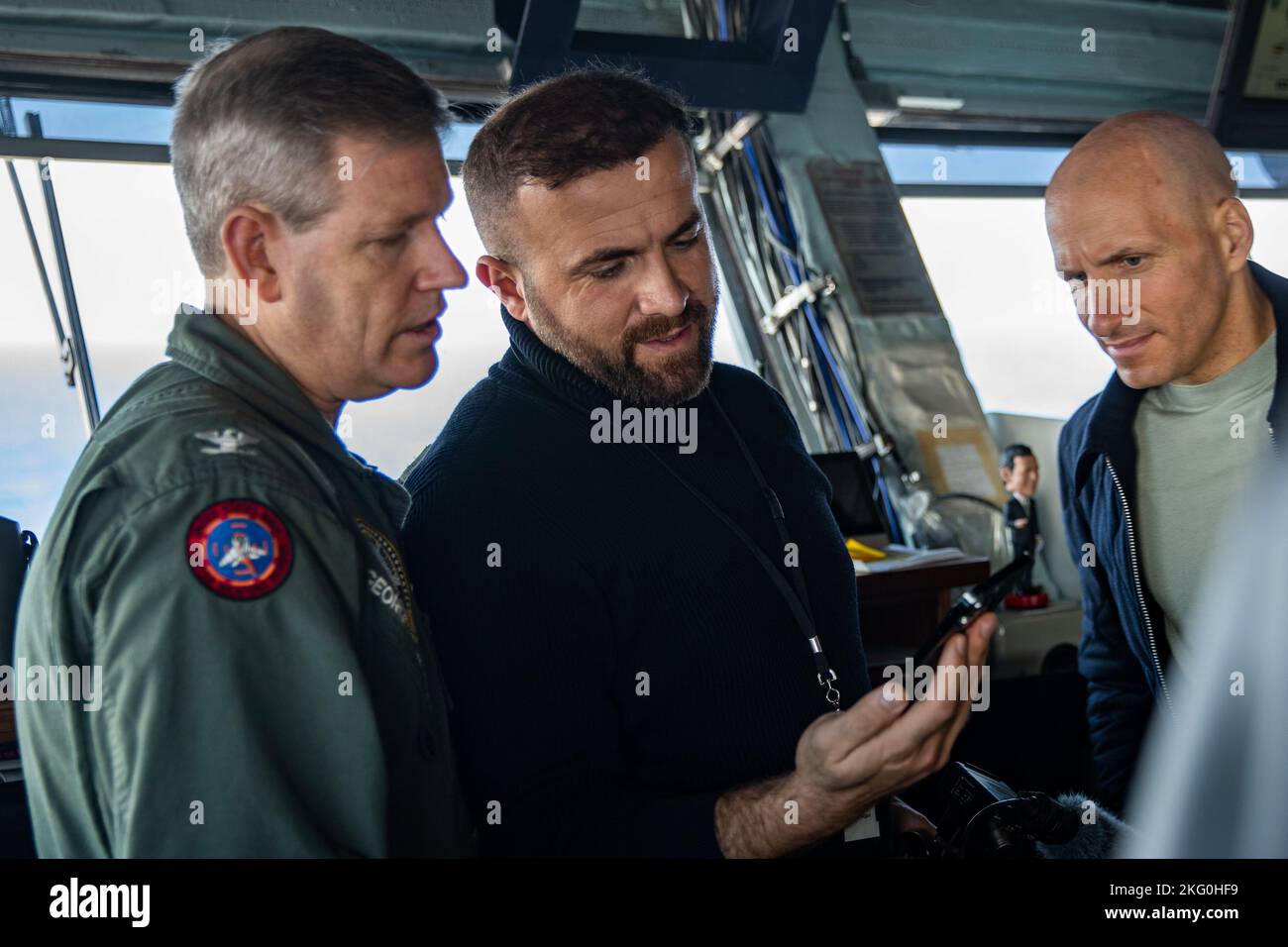 221019-N-ZG822-1228 ADRIATIC SEA (Oct. 19, 2022) Festim Begari, center ...