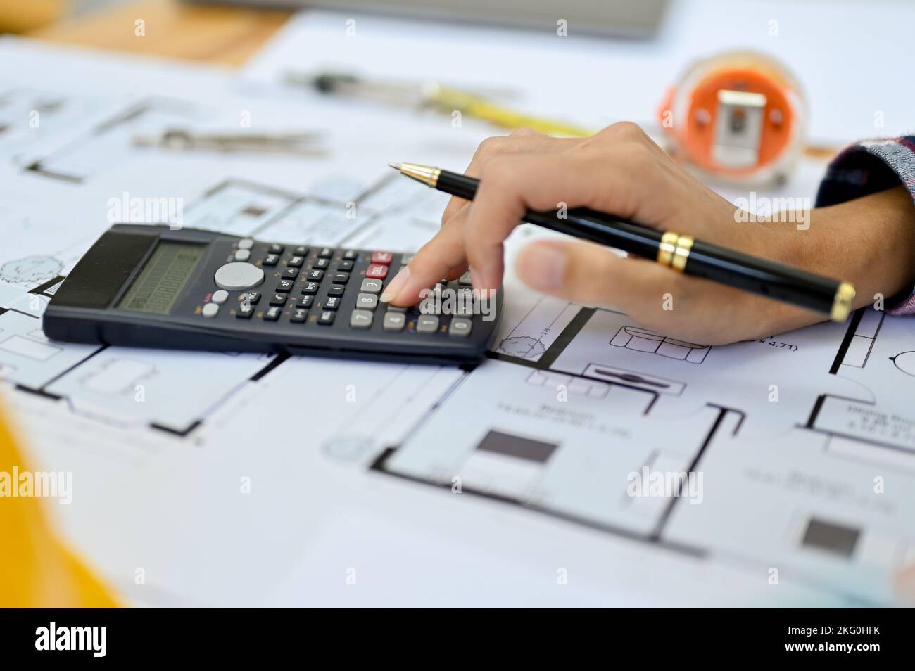 close-up hand image, Professional Asian female architect or engineer ...