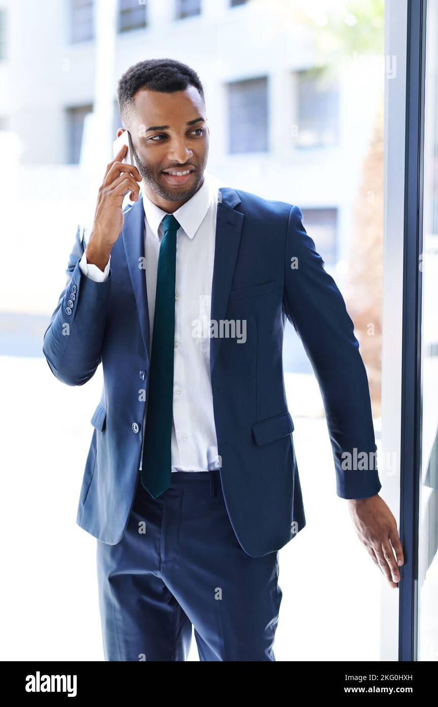 Im heading to a meeting now. A handsome african american businessman ...