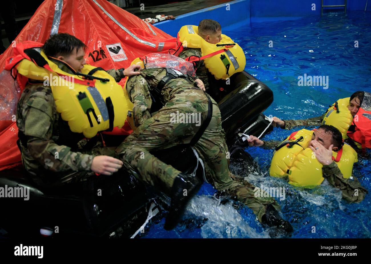 Soldiers from the 12th Combat Aviation Brigade help each other board a ...