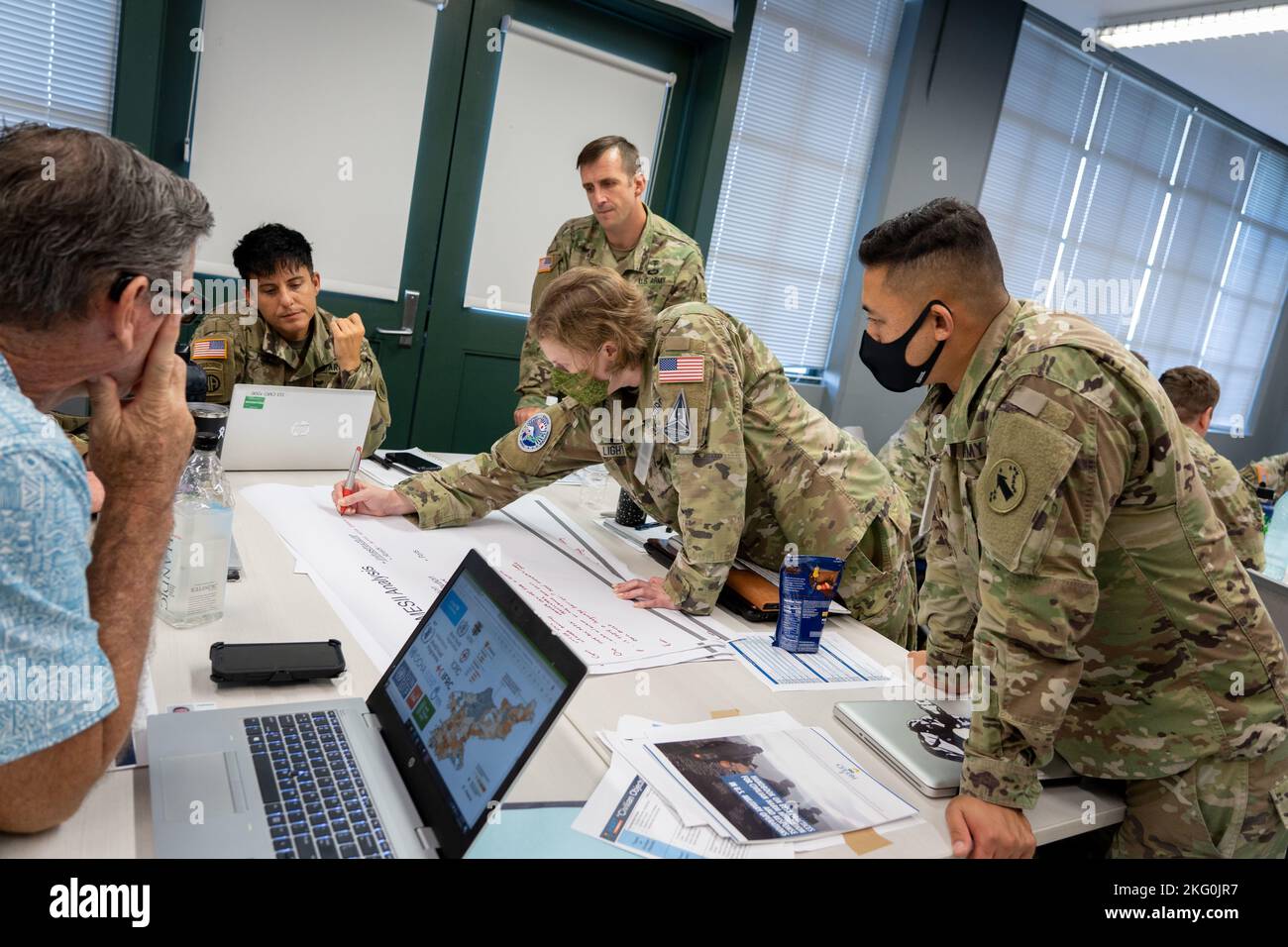 Military and civilian students attend the CFE-DM Humanitarian ...