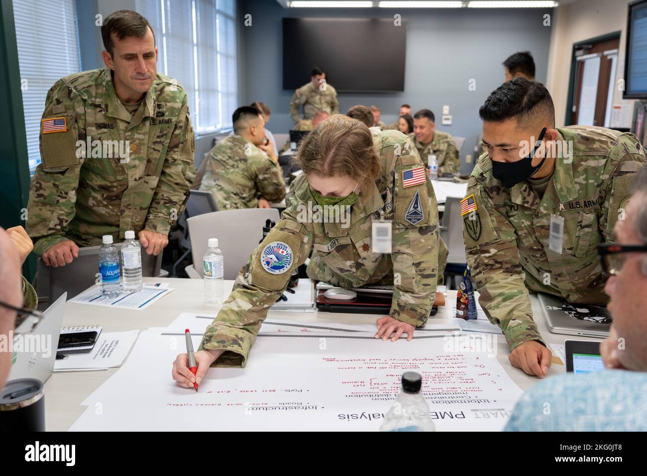 Military and civilian students attend the CFE-DM Humanitarian ...