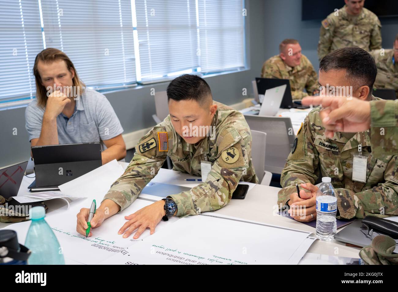 Military and civilian students attend the CFE-DM Humanitarian ...